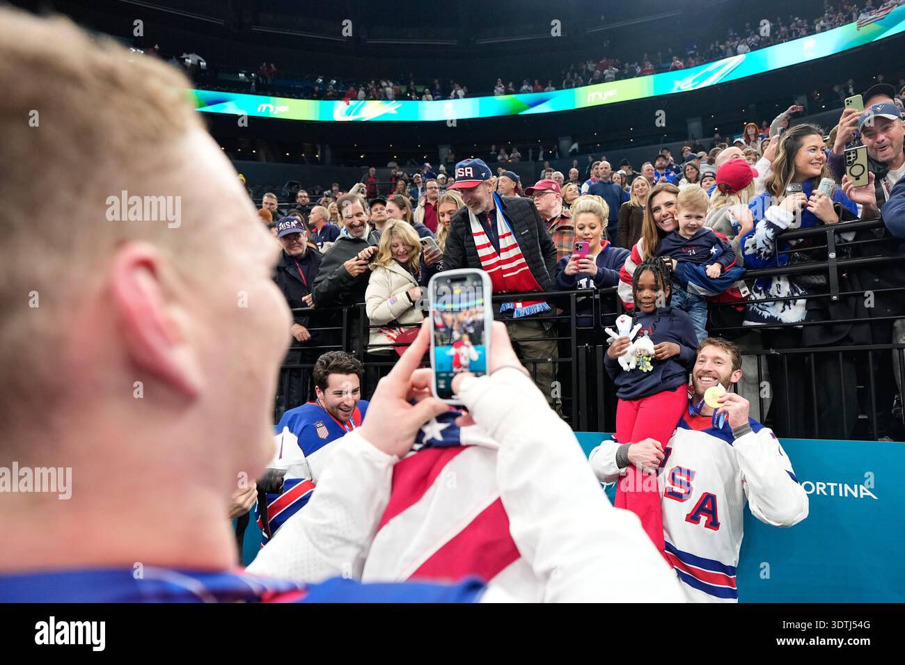 United States' Jaccob Slavin (74) poses with his gold medal after the ...