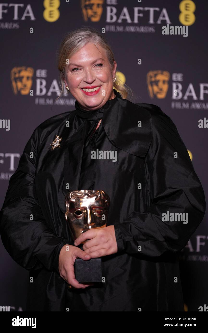 Kate Hawley poses with the award for costume design for 'Frankenstein ...