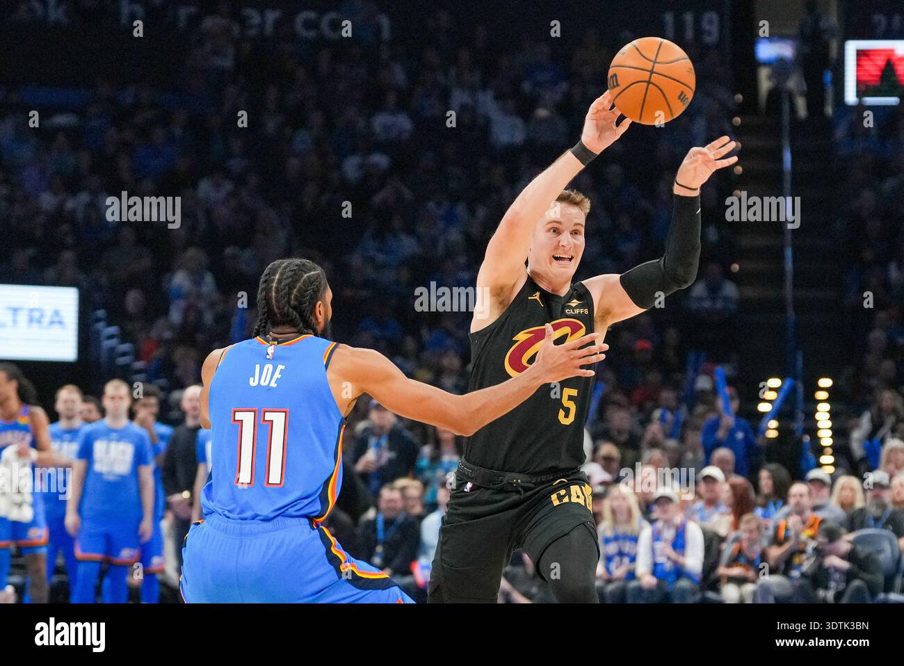 Cleveland Cavaliers guard Sam Merrill (5) passes the ball against ...