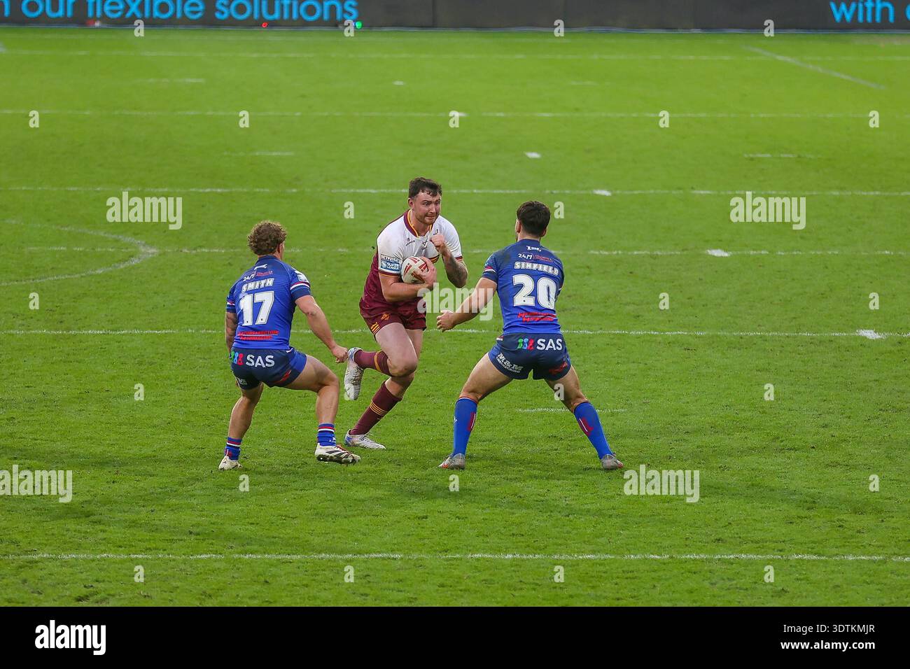 Fenton Rogers runs at Jack Sinfield and Harvey Smith during the BetFred ...