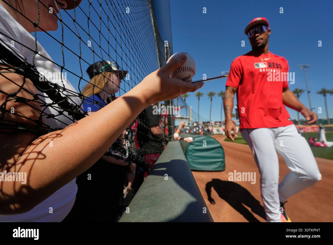 Cincinnati Reds left fielder Will Benson signs autographs before a ...