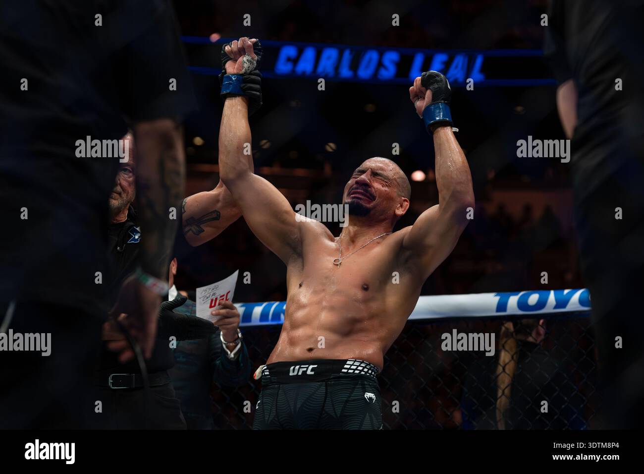 Carlos Leal cries after winning his UFC Fight Night: Strickland vs ...