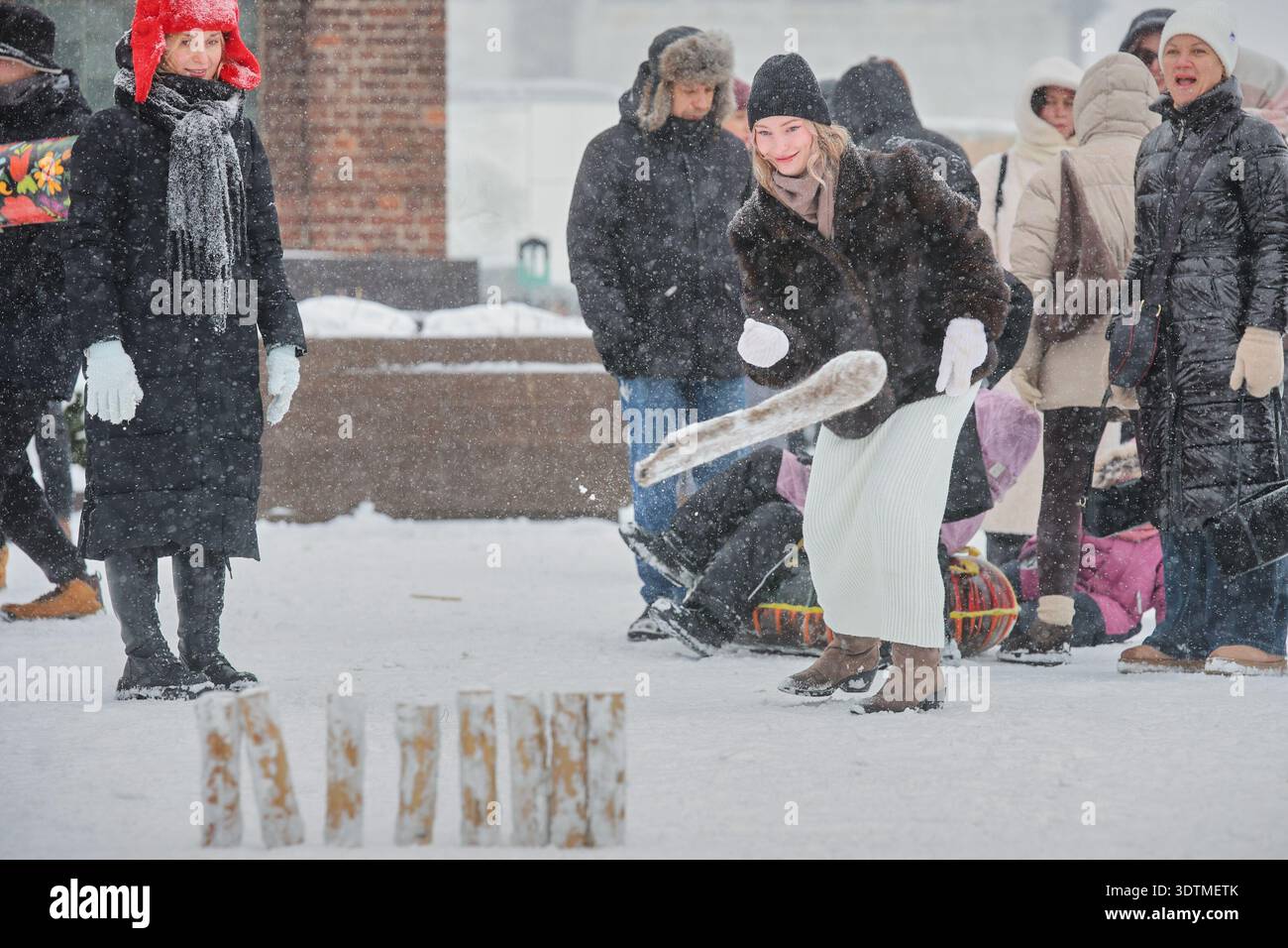 (260223) -- ST. PETERSBURG, Feb. 23, 2026 (Xinhua) -- A woman plays a ...