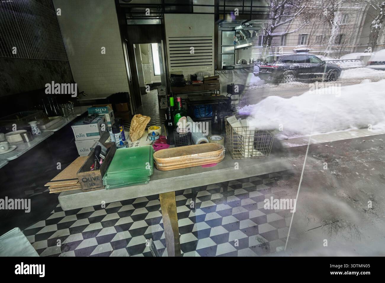 A view into a window of a permanently closed cafe in Moscow, on Friday ...