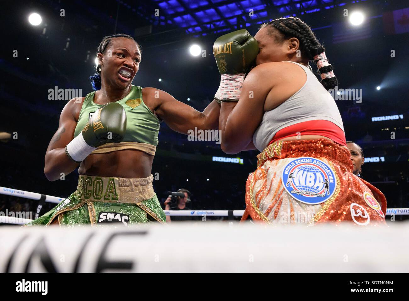 Claressa Shields, left, hits Franchon Cruz-Dezurn with a left in the ...
