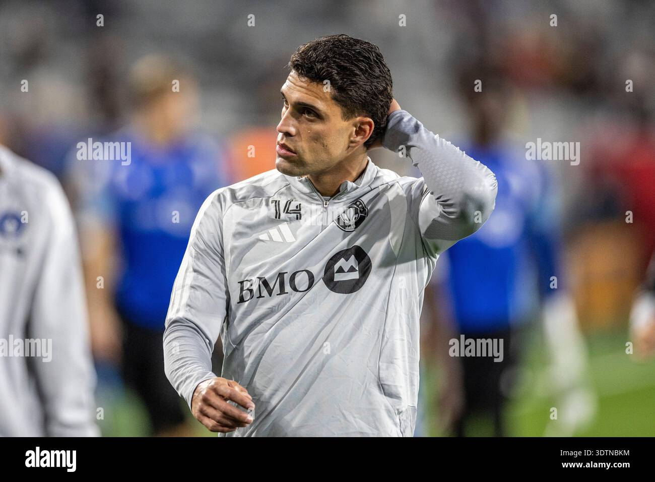 CF Montreal forward Daniel Rios (14) comes off the field after warmups ...