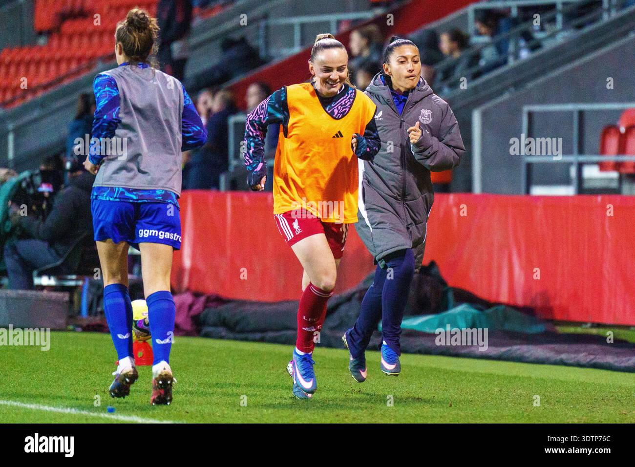 St Helens, UK, 22nd Feb 2026: Liverpool’s Lily Woodham (centre) and ...