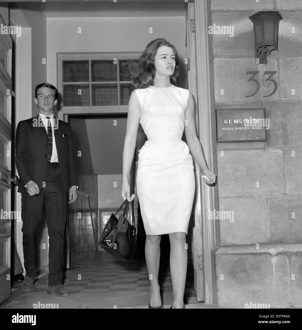 Christine Keeler pictured as she leaves a flat in Devonshire Street ...