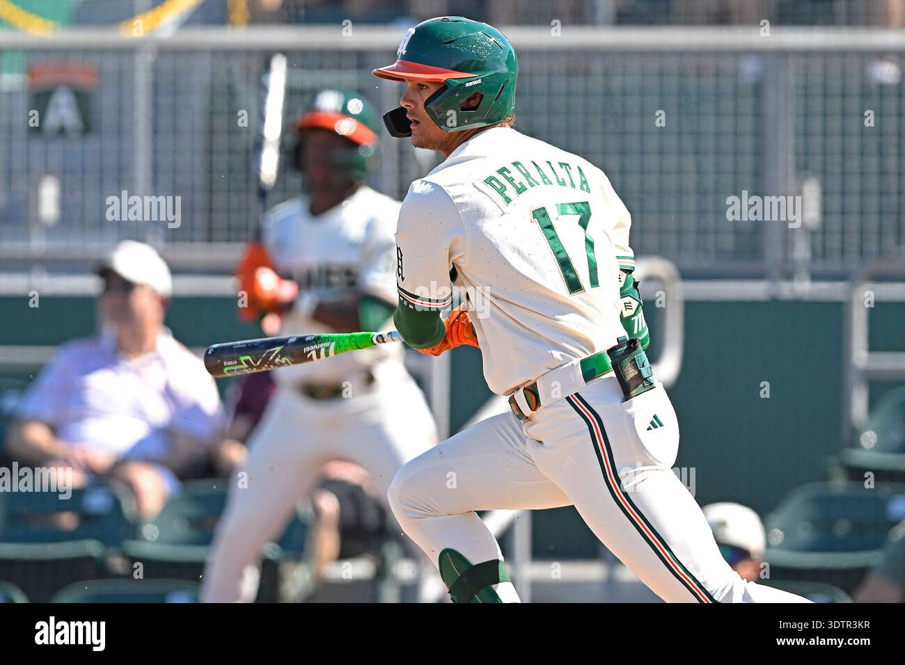 CORAL GABLES, FL - FEBRUARY 21: Miami outfielder Fabio Peralta (17 ...