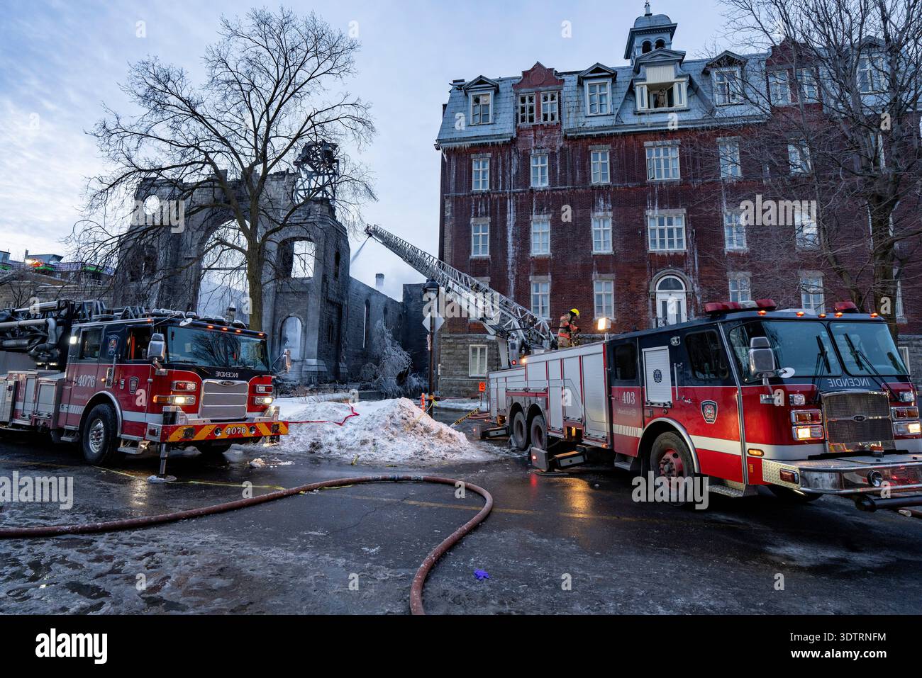 Firefighters respond to a five-alarm fire at Saint-Paul Catholic Church ...