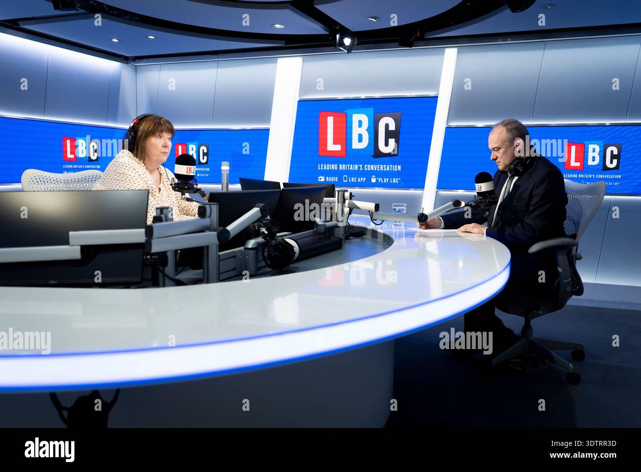 Liberal Democrat leader Sir Ed Davey takes part in a LBC phone-in ...