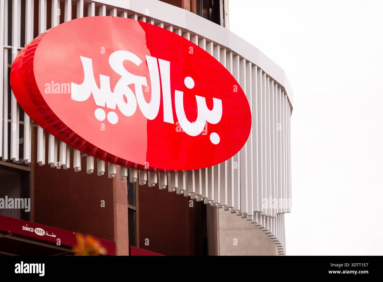 Aqaba, Jordan - 6th december, 2025: close up Alameed Coffee red logo ...