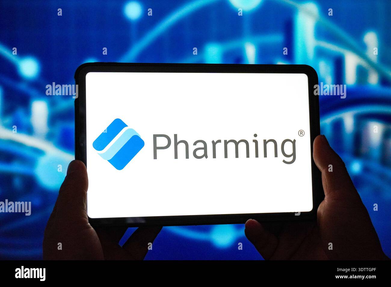 In this photo illustration, the Pharming logo is seen displayed on the ...