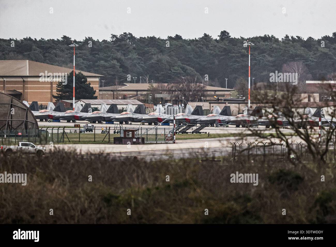 USAF F-22 Raptors lined up awaiting deployment to the Middle East at ...