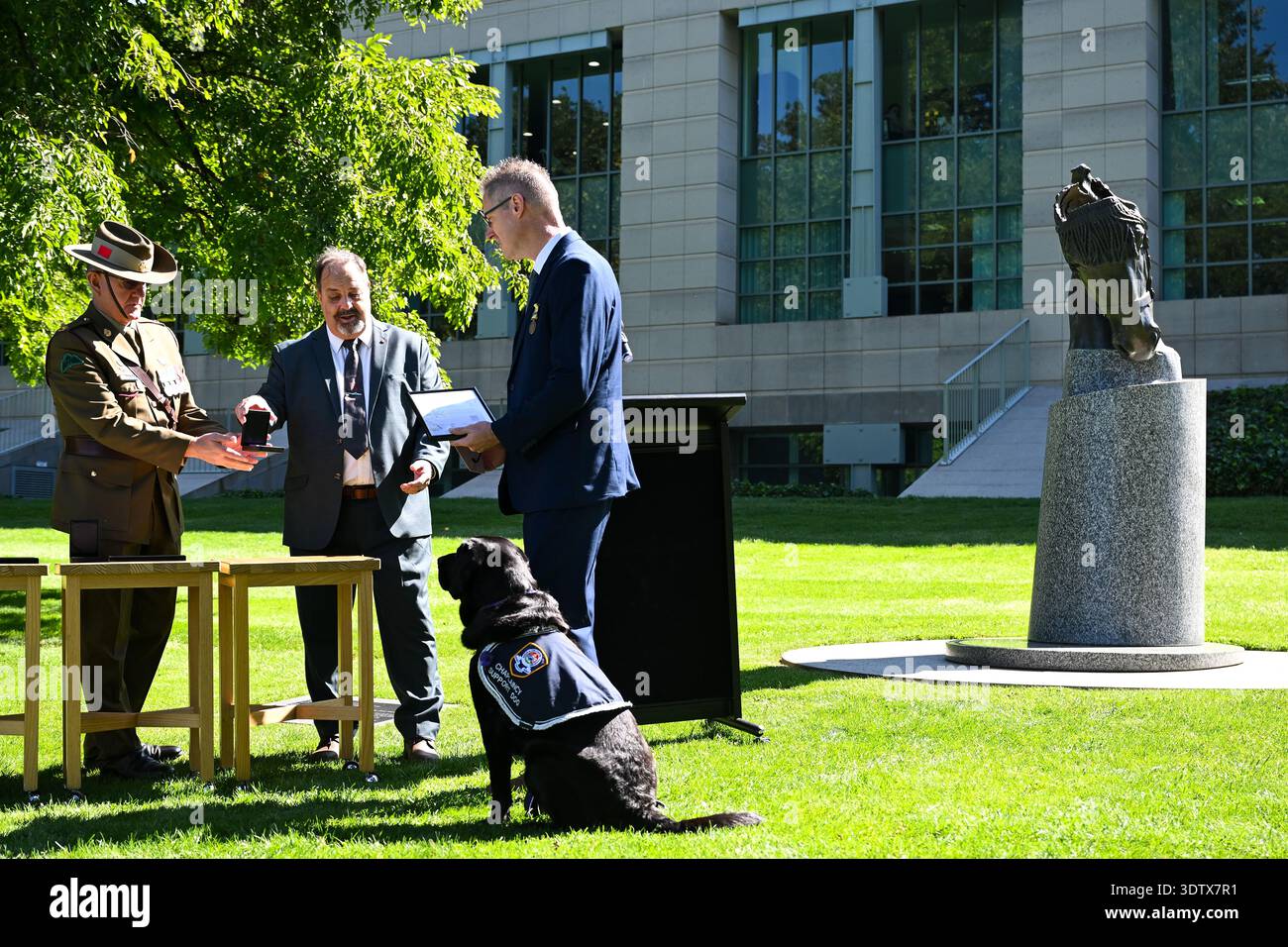 Canberra, Australia. 24th Feb, 2026. Suppport dog Lachie and his ...