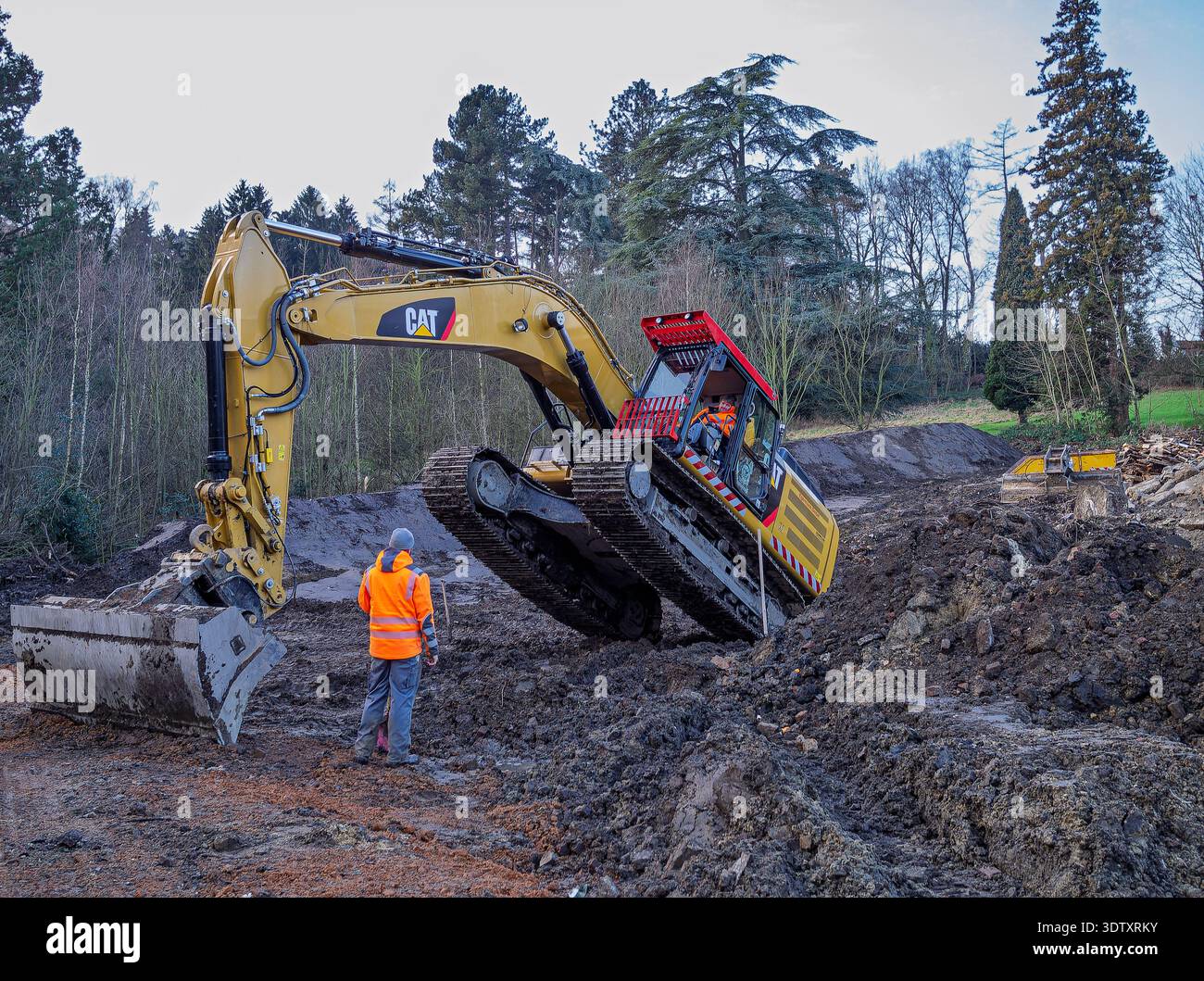 Construction workers wearing orange hi-res stock photography and images ...