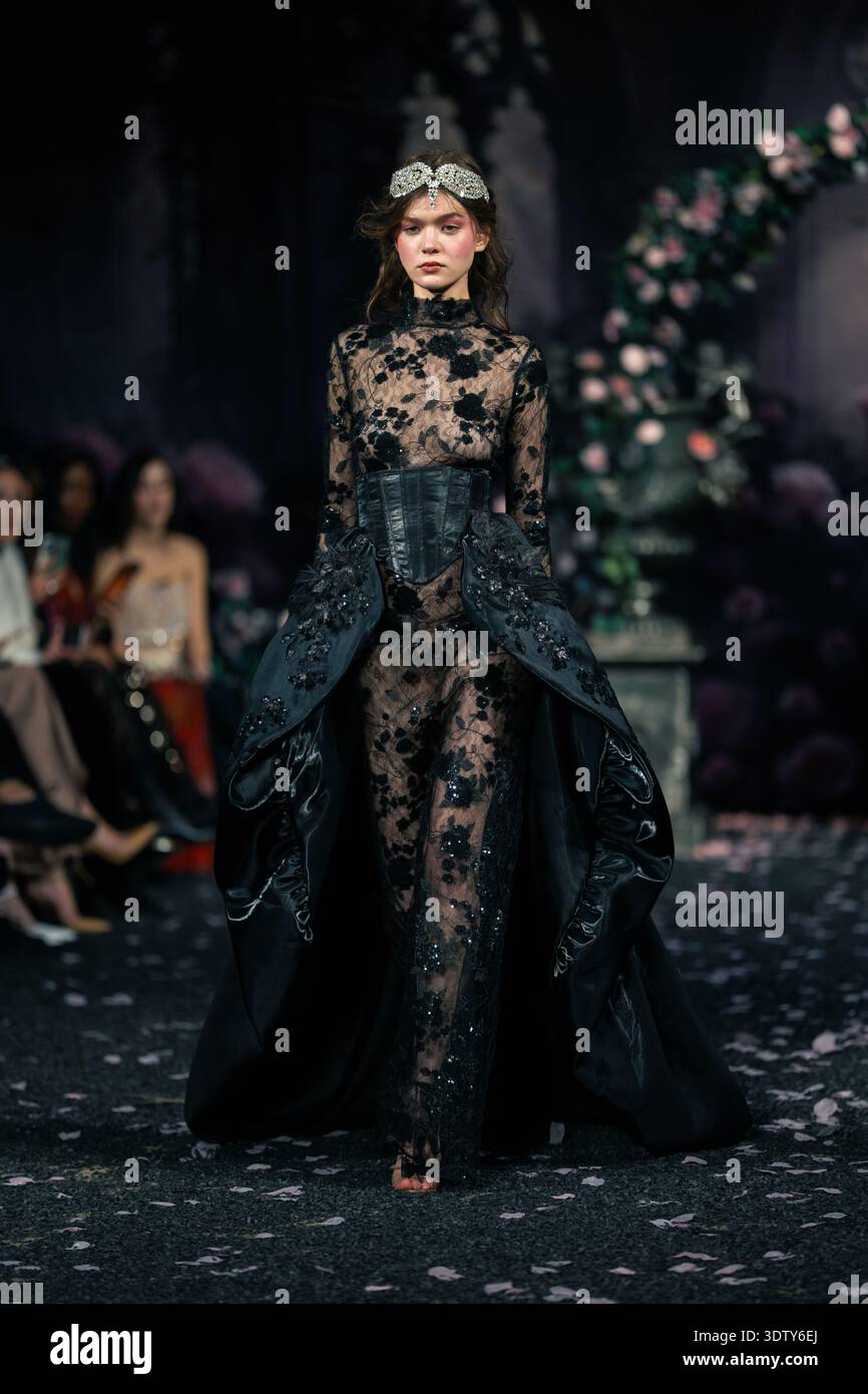 London, UK. 23rd Feb, 2026. A model walks the runway at the Aadnevik ...
