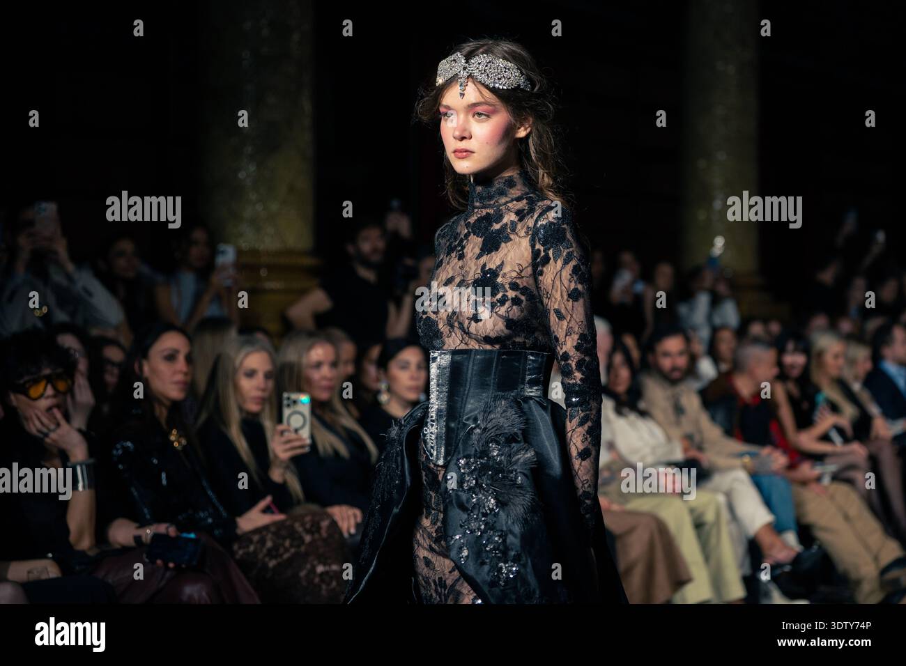 London, UK. 23rd Feb, 2026. A model walks the runway at the Aadnevik ...