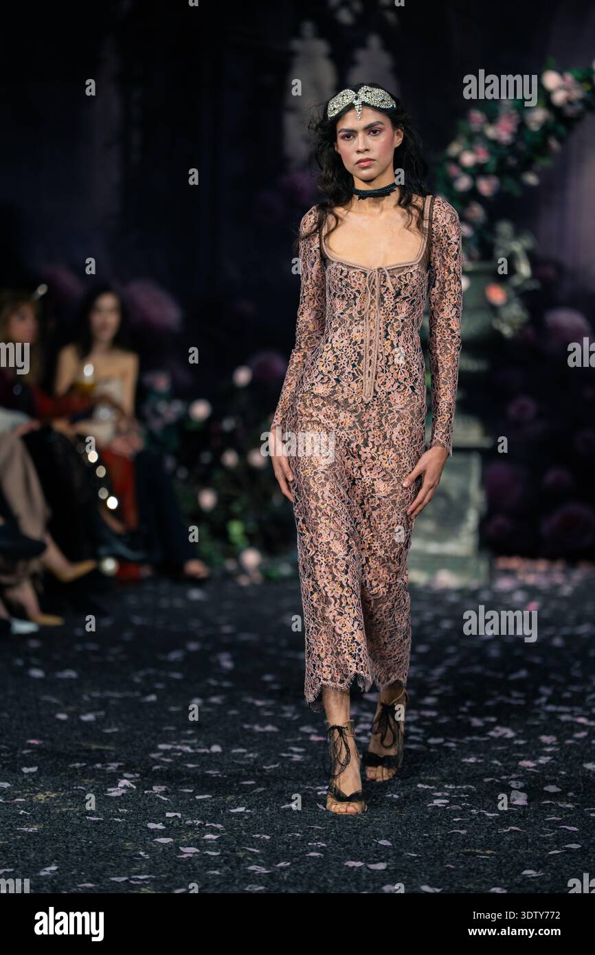 London, UK. 23rd Feb, 2026. A model walks the runway at the Aadnevik ...