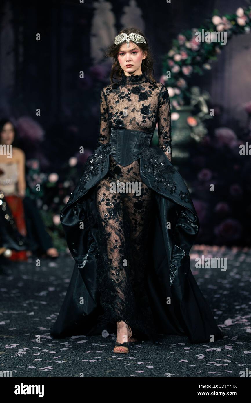 London, UK. 23rd Feb, 2026. A model walks the runway at the Aadnevik ...