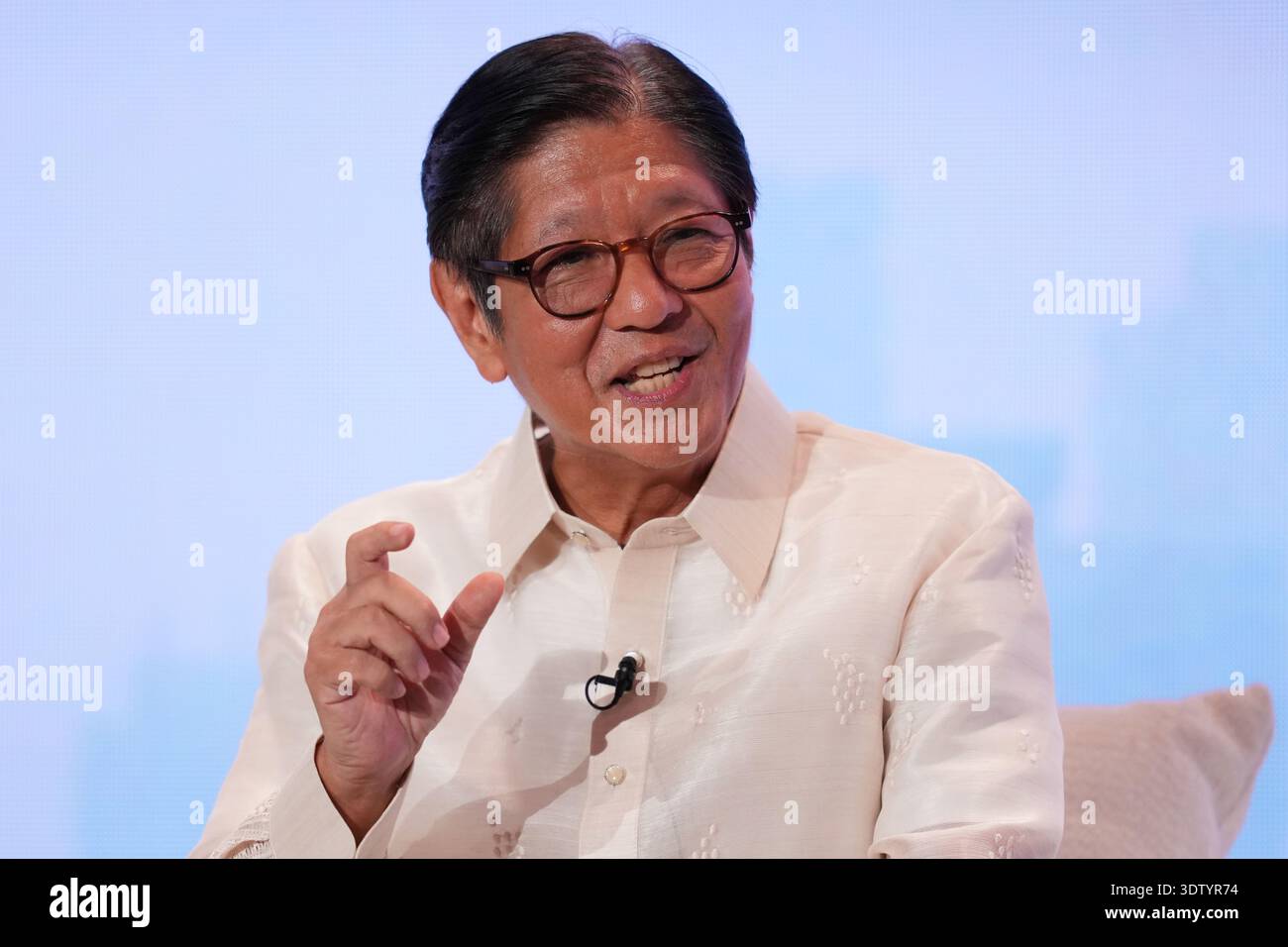 Philippine President Ferdinand Marcos Jr. smiles as he answers ...