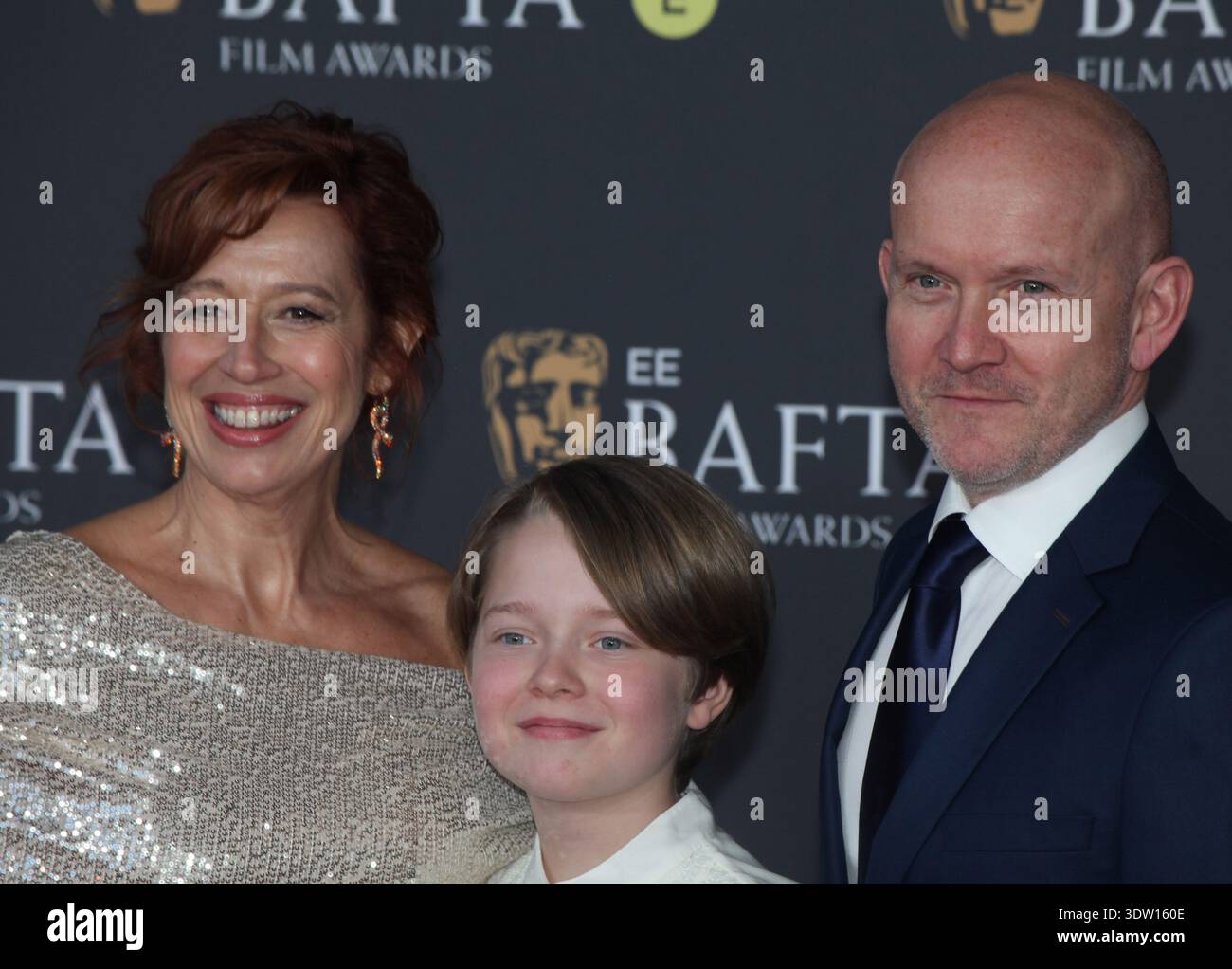 London, UK. Jacobi Jupe and family at the 2026 EE BAFTA Film Awards ...