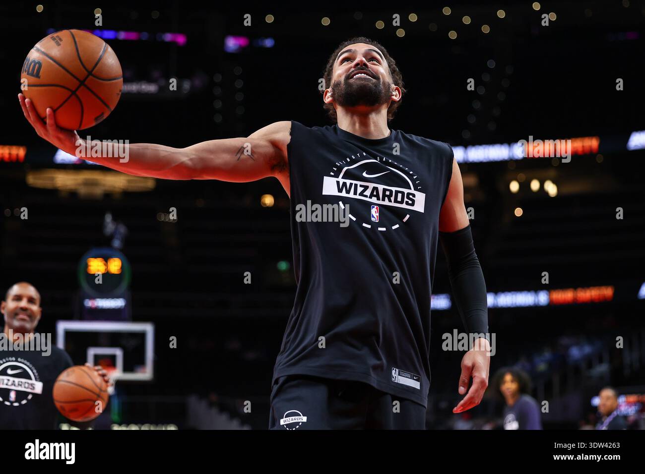 Washington Wizards guard Trae Young shoots during warmups before an NBA ...