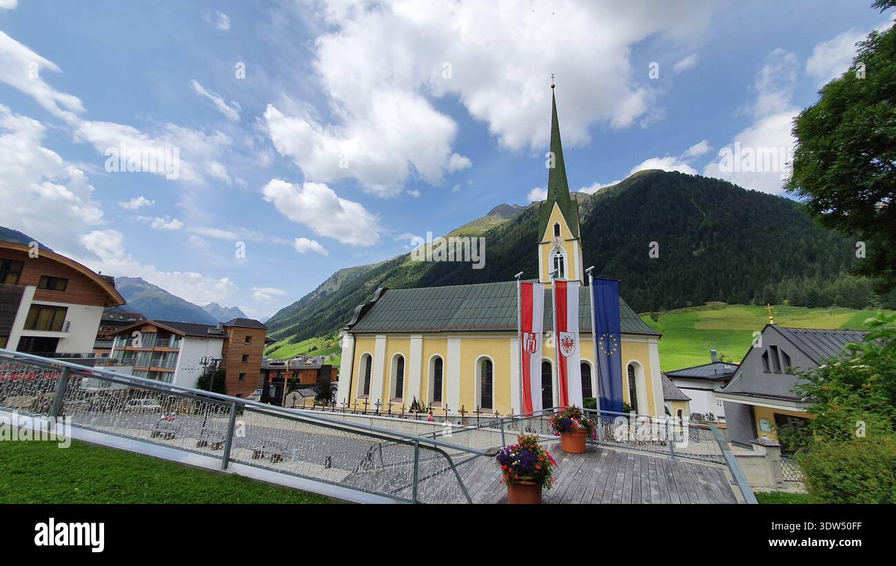 St. Nikolaus church from Ischgl Austrian resort,Alps Mountains Stock ...