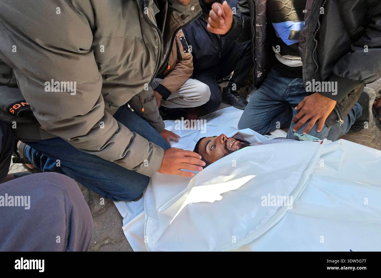 Palestinians bid farewell to the body of Akram Hassan Al-Arjani at ...