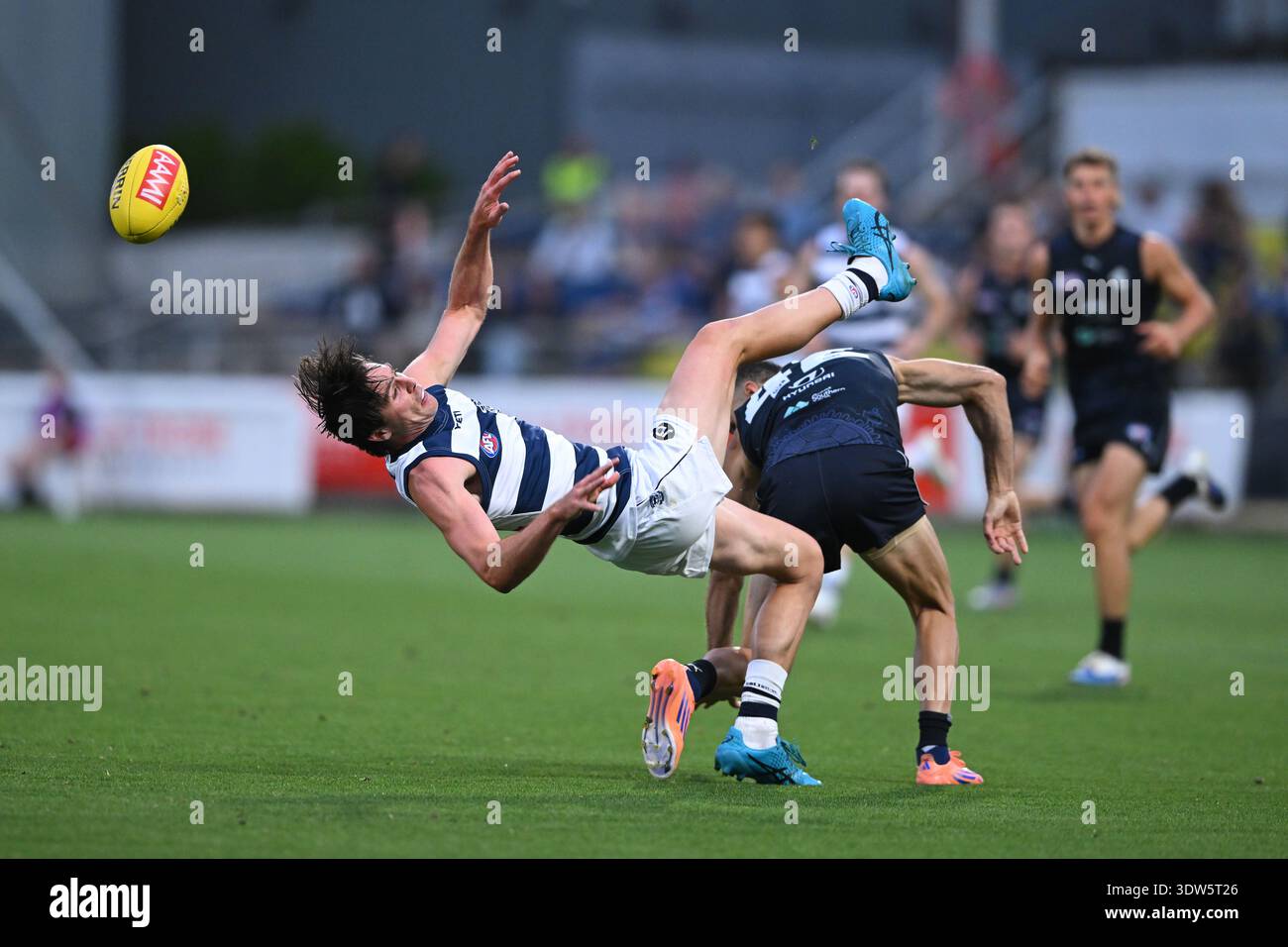 Oliver Henry of Geelong in action during the AFL Community Series match ...
