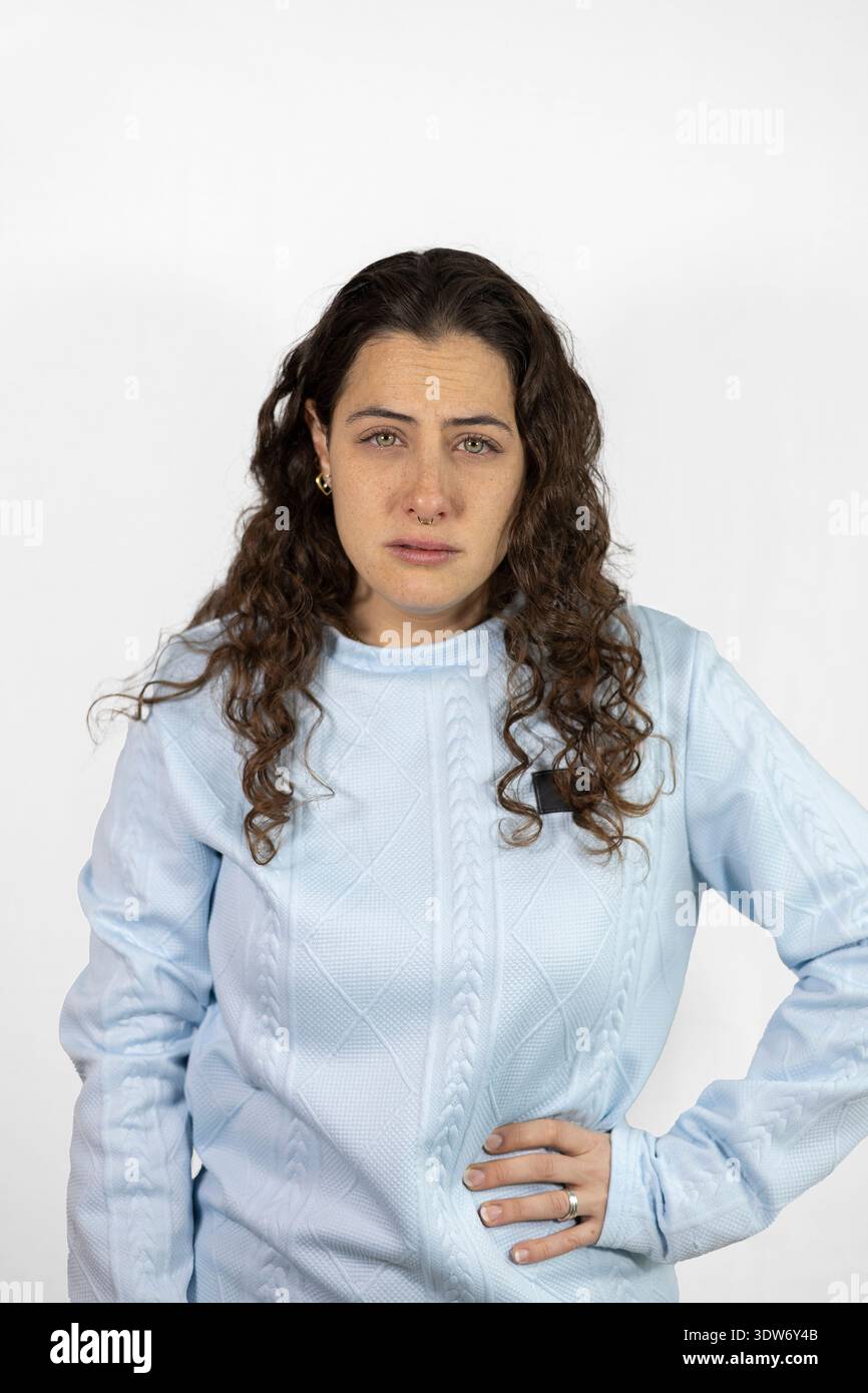 Person wearing blue sweater hi-res stock photography and images - Alamy