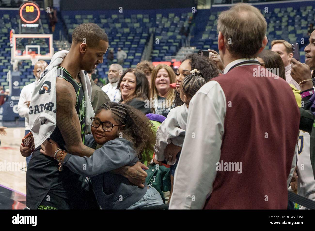 New Orleans Pelicans guard Dejounte Murray (5) hugs his daughter Riley ...