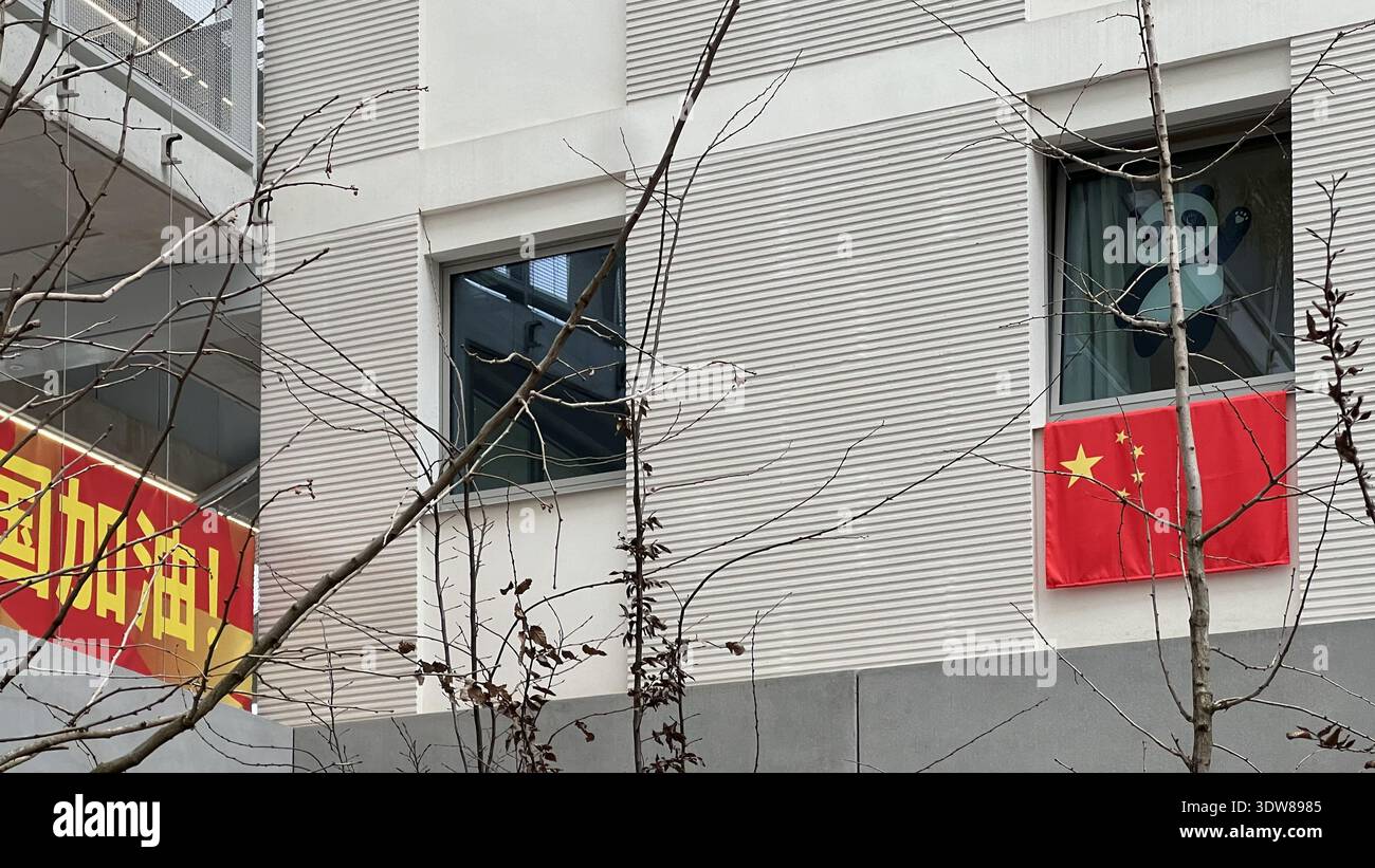 Milan, Italy - February 24, 2026: Chinese national flags displayed on ...