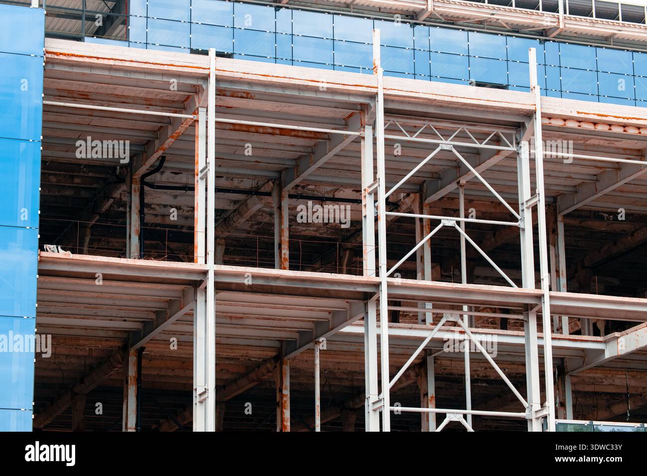 The skeletal structure of a new building is visible, showcasing its ...