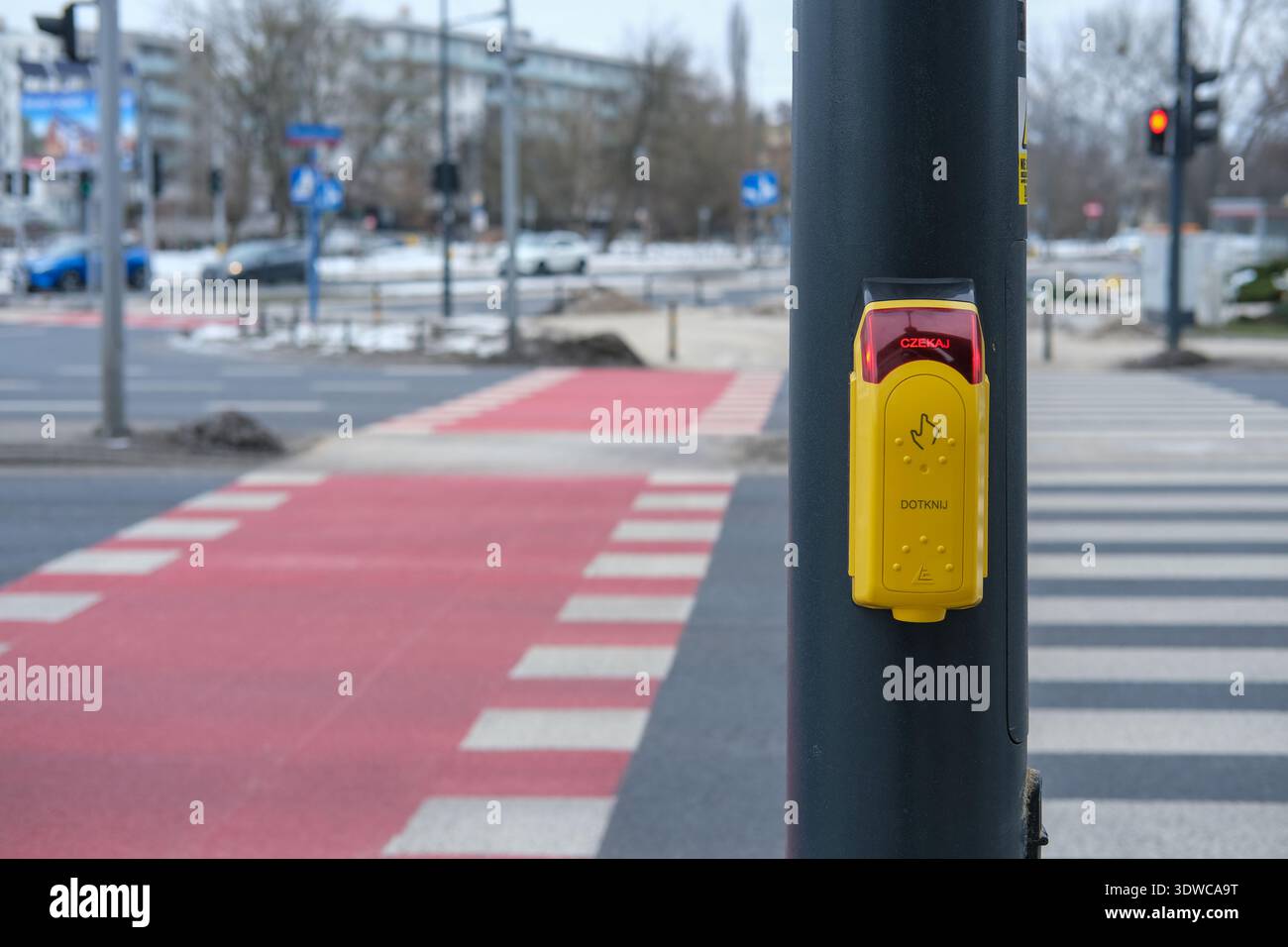 Pedestrian crossing request button with red signal illuminated on ...