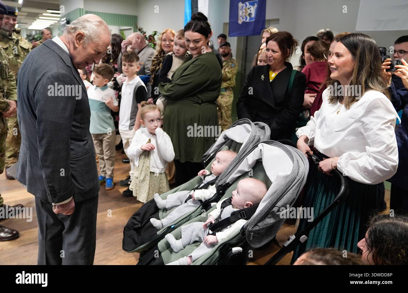 King Charles III meets with eight month old twins Hamish and Brodie ...