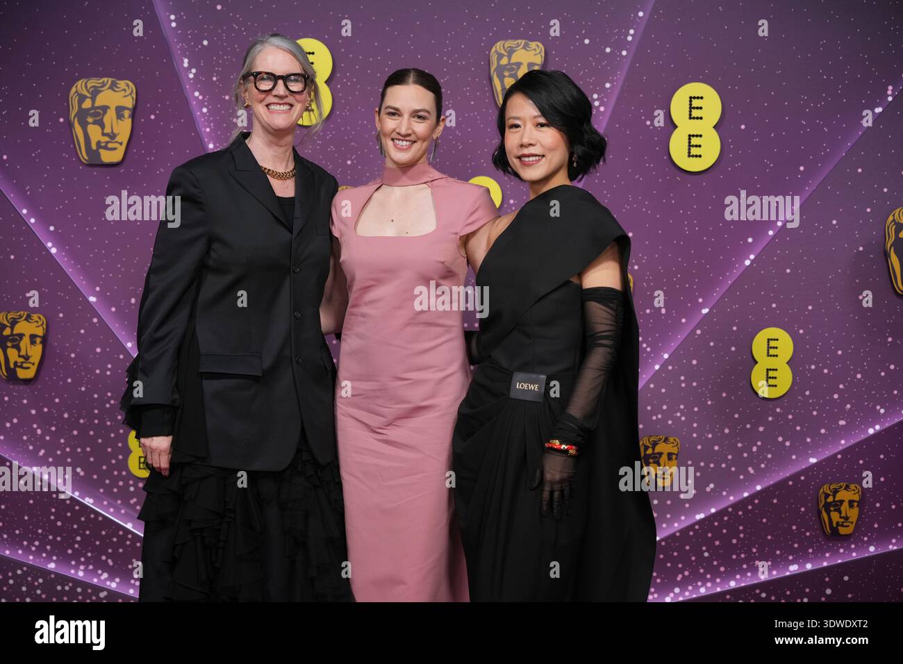 Mary Alice Drumm, Madeline Sharafian, Domee Shi pose for photographers ...