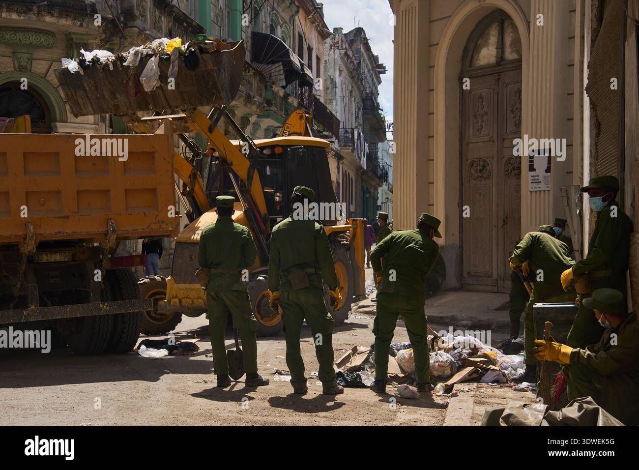 Soldiers collect garbage in Old Havana, Cuba, Thursday, Feb. 26, 2026 ...