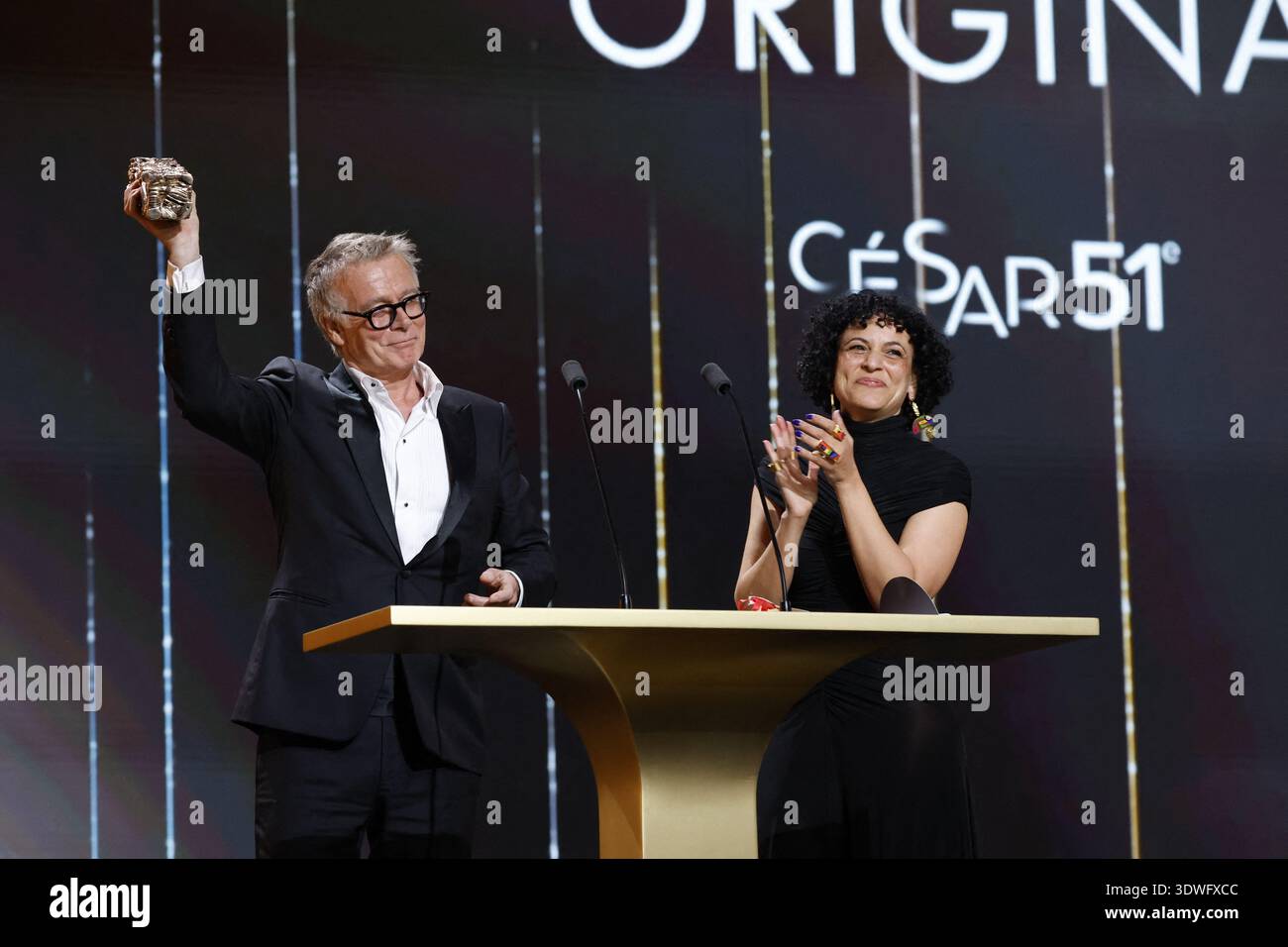 Paris, France. 26th Feb, 2026. Franck Dubosc and Sarah Kaminsky during ...