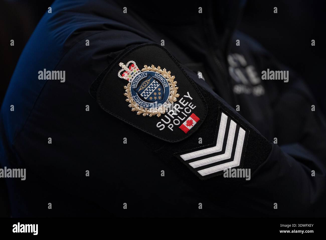 A Surrey Police patch is worn by an officer at RCMP "E" Division ...