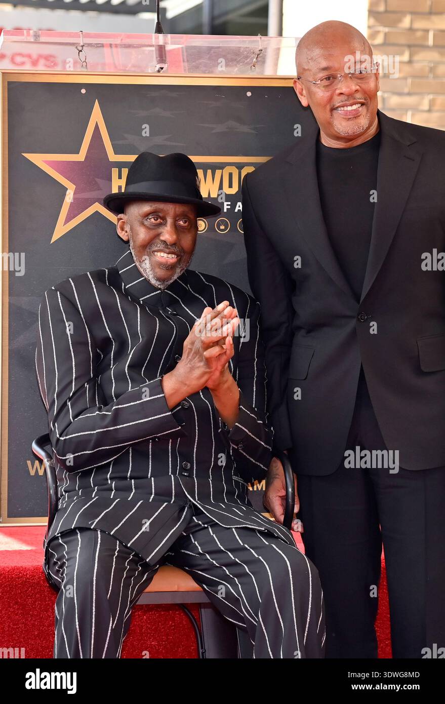 Actor and director Bill Duke (L) is joined by Dr. Dre during an ...