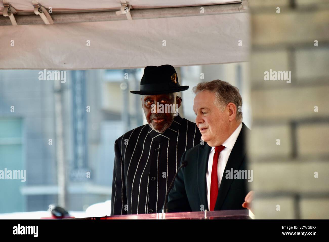 Bill Duke poses with Hollywood Walk of Fame producer Jerry Neuman ...