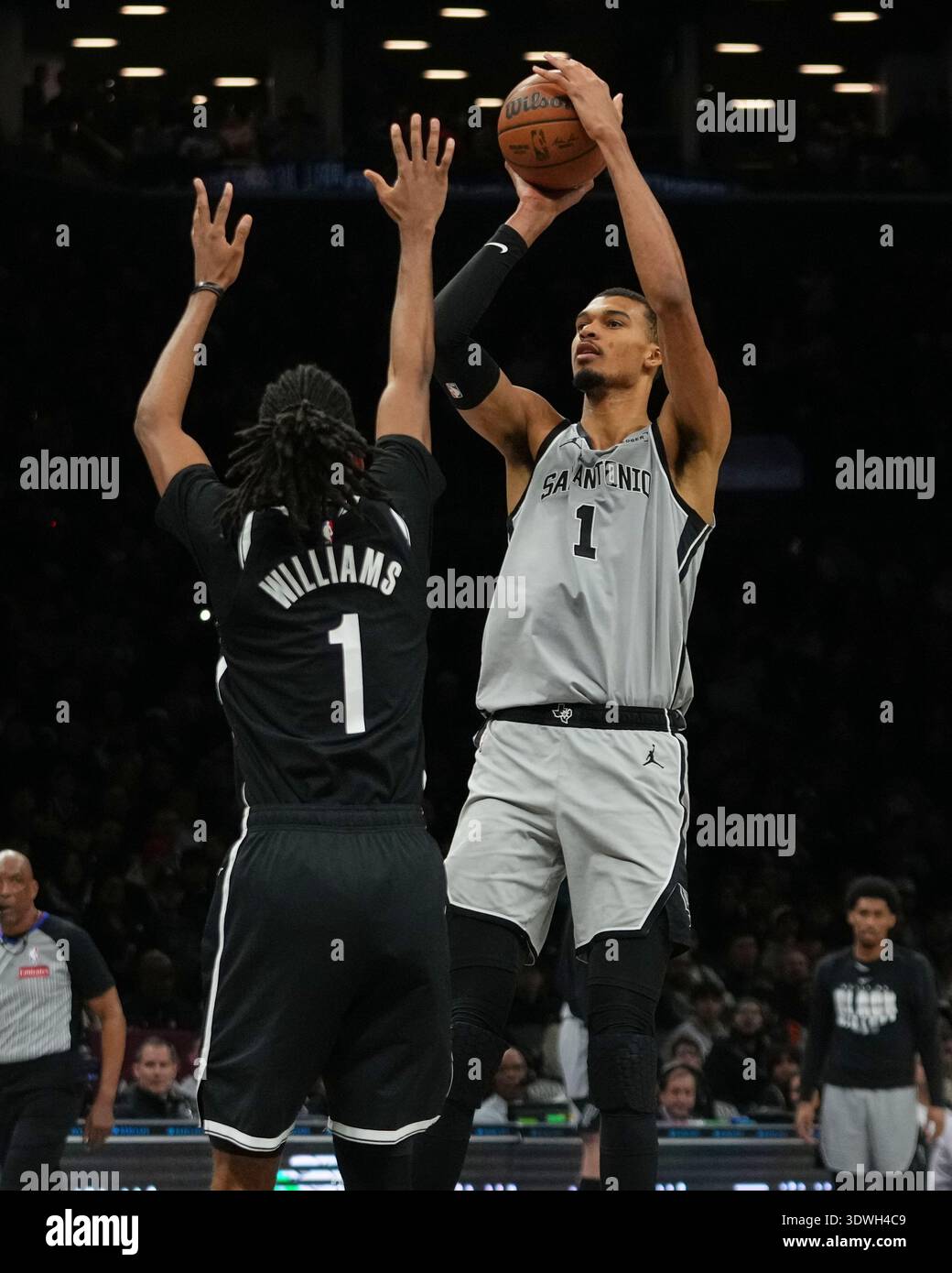 San Antonio Spurs' Victor Wembanyama (1) shoots over Brooklyn Nets ...