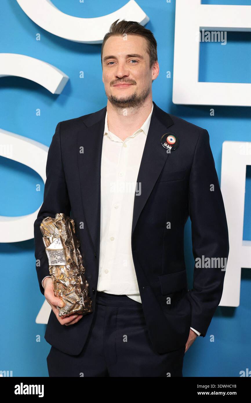 Pierre Lottin poses with the "Best Supporting Actor Cesar" Award during ...