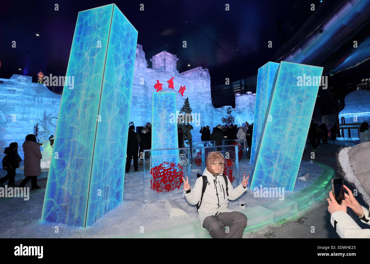 Visitors enjoy the newly upgraded Dream Ice and Snow Museum at Harbin ...