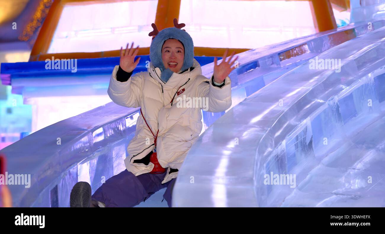 Visitors enjoy the newly upgraded Dream Ice and Snow Museum at Harbin ...