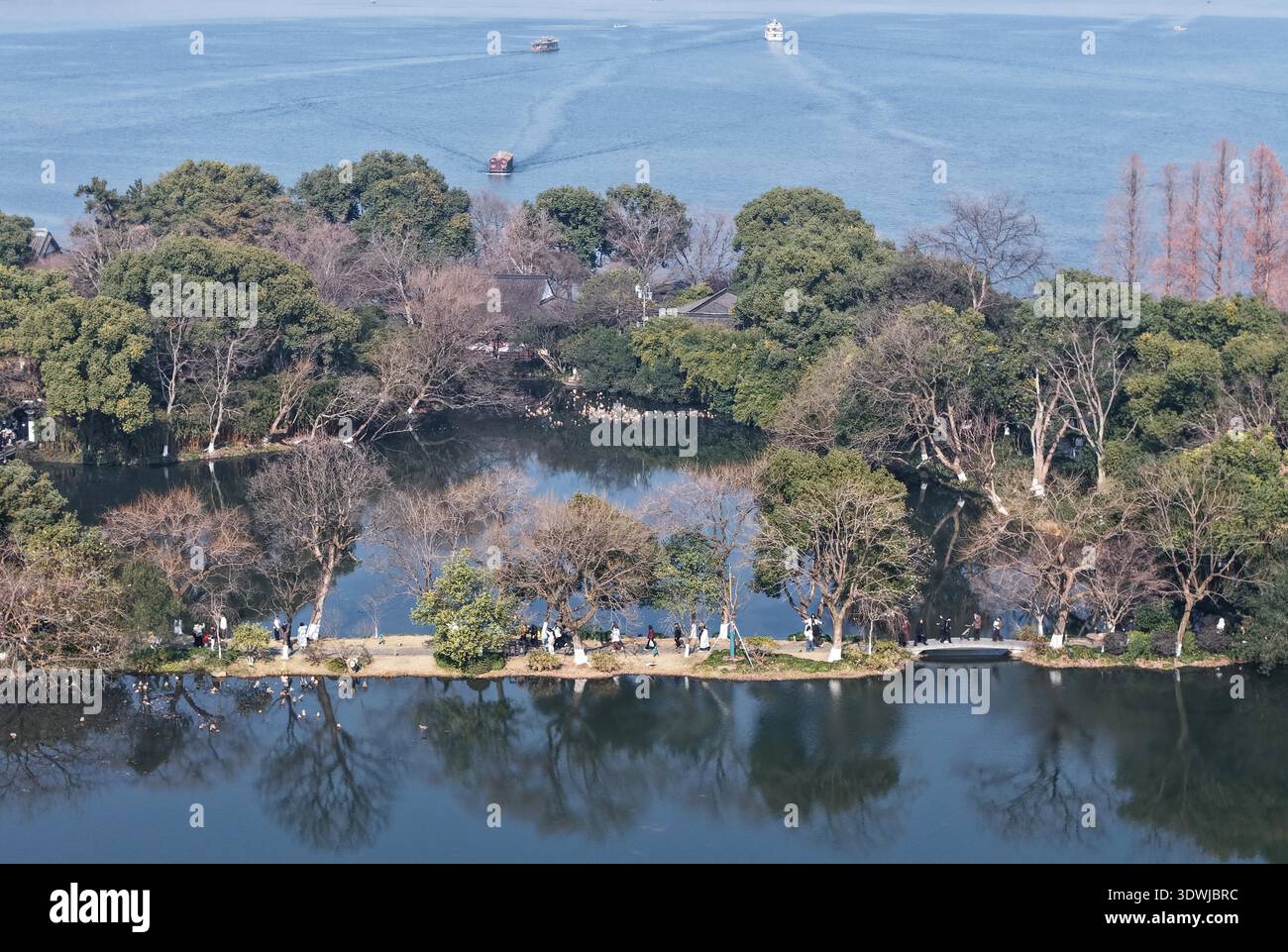 Aerial photo shows tourists visiting the West Lake in Hangzhou City ...