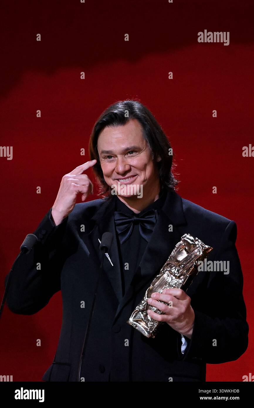 Jim Carrey poses with the Honorary Cesar Award during the 51st Cesar ...