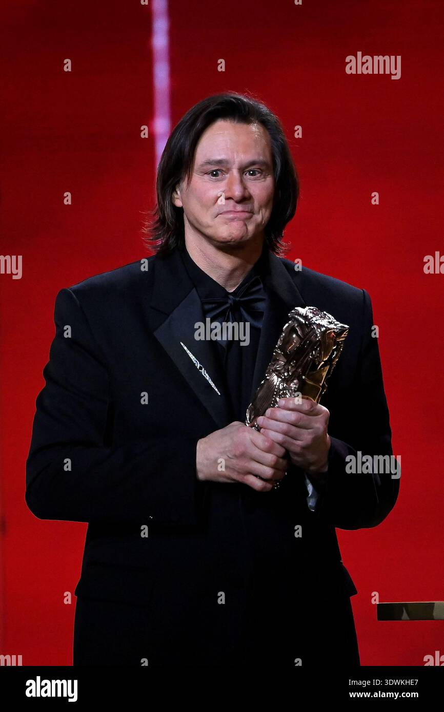 Jim Carrey poses with the Honorary Cesar Award during the 51st Cesar ...