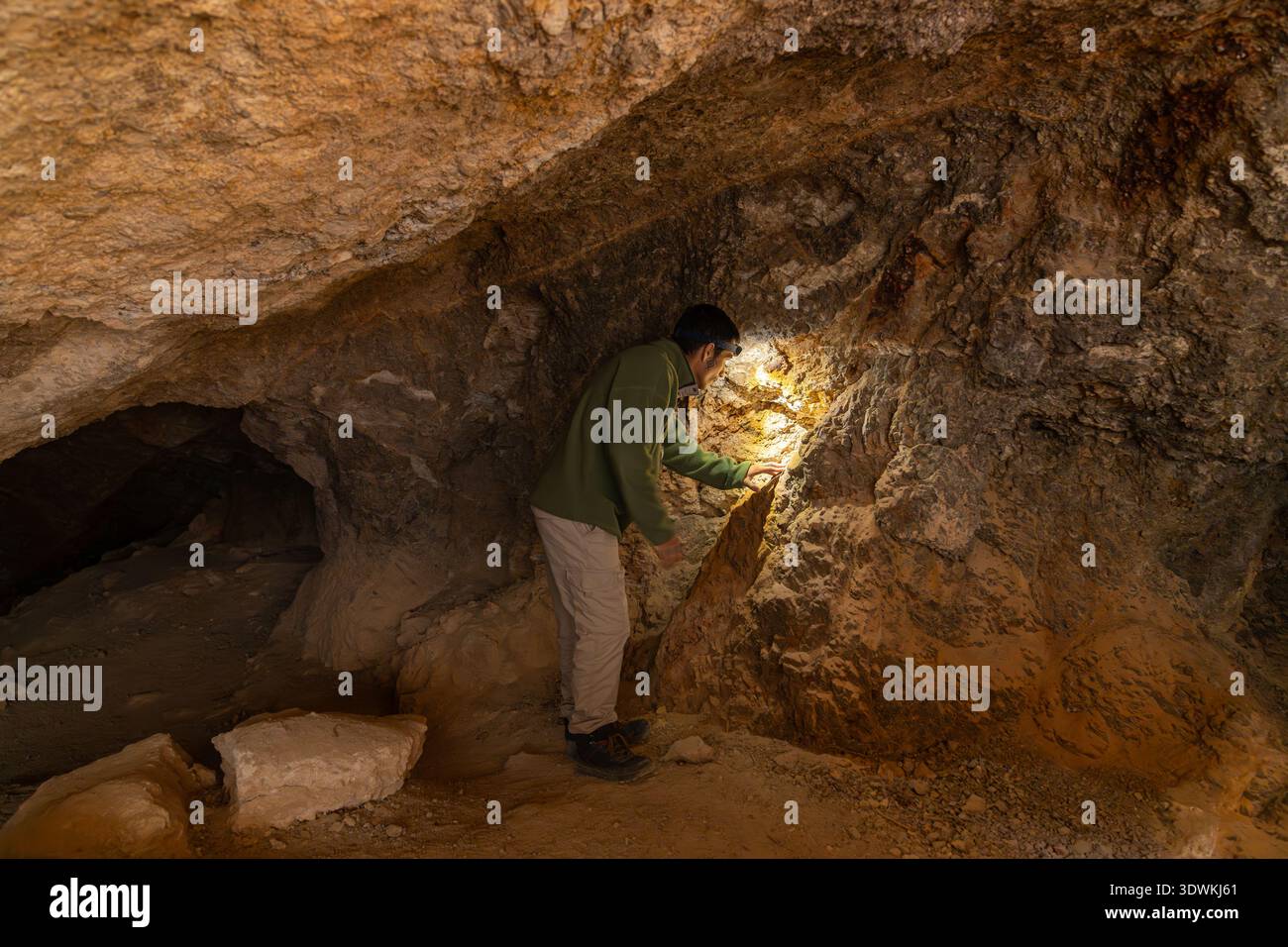 Geologist studying rock formations hi-res stock photography and images ...